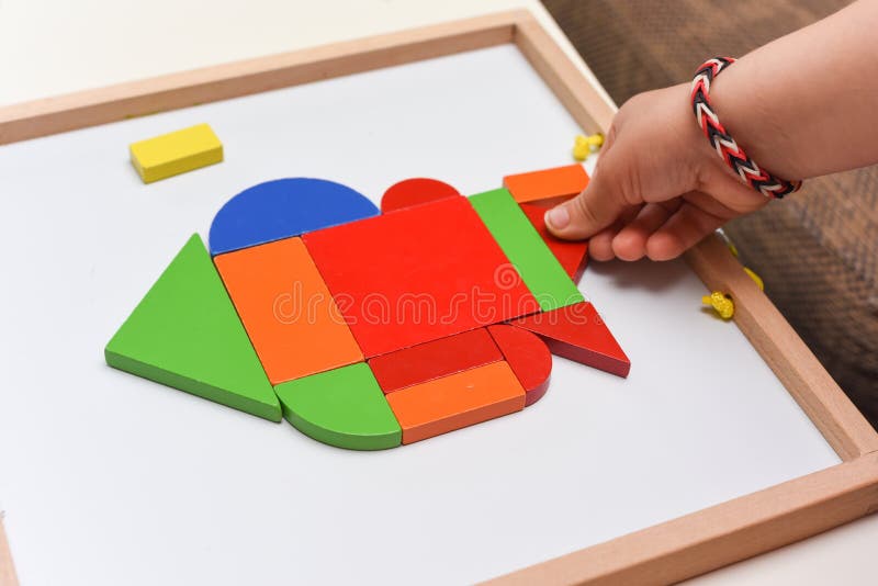 Child Playing with Colourful Puzzle Toy Making Shapes To Learn at Home ... Child Playing with Colourful Puzzle Toy Making Shapes To Learn at Home ...