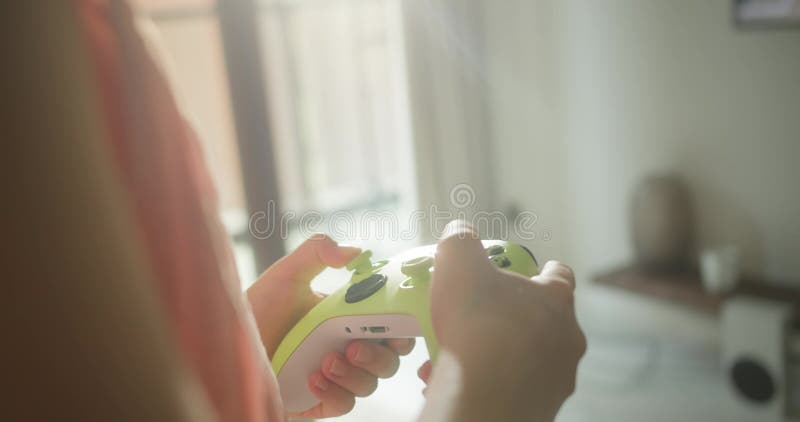 Child Playing Computer Games. Close-up Hands Holding a Joystick ...