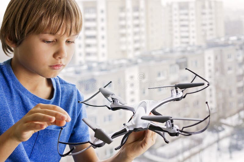 Kid Playing With Drone Outdoors Against Blue Sky Stock Photo - Image of ...