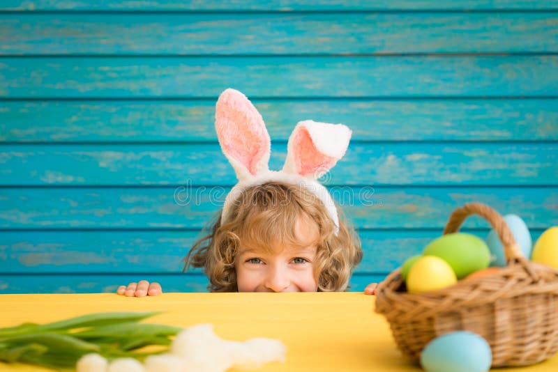 Child Playing with Easter Bunny Stock Image - Image of eggs, costume ...
