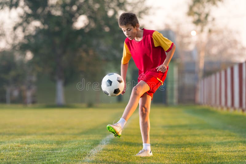 Child playing football stock image. Image of sport, outdoors - 61835895