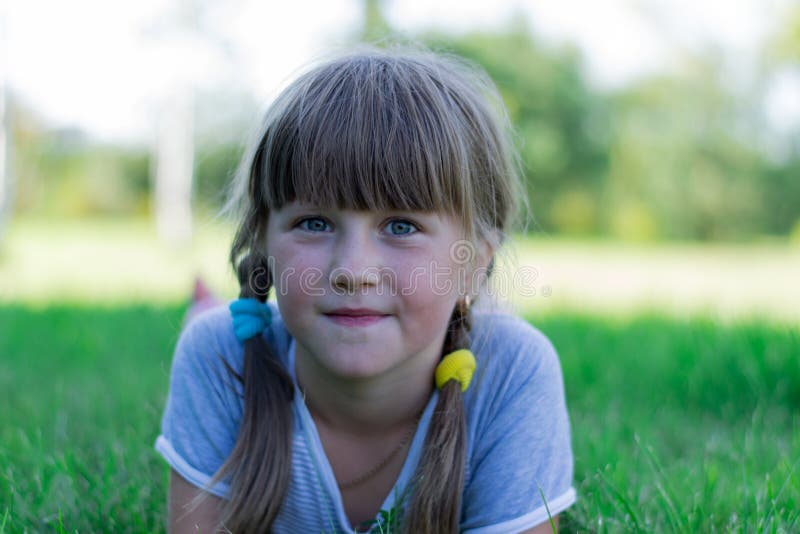 Child playing on the grass stock image. Image of outdoors - 44325107