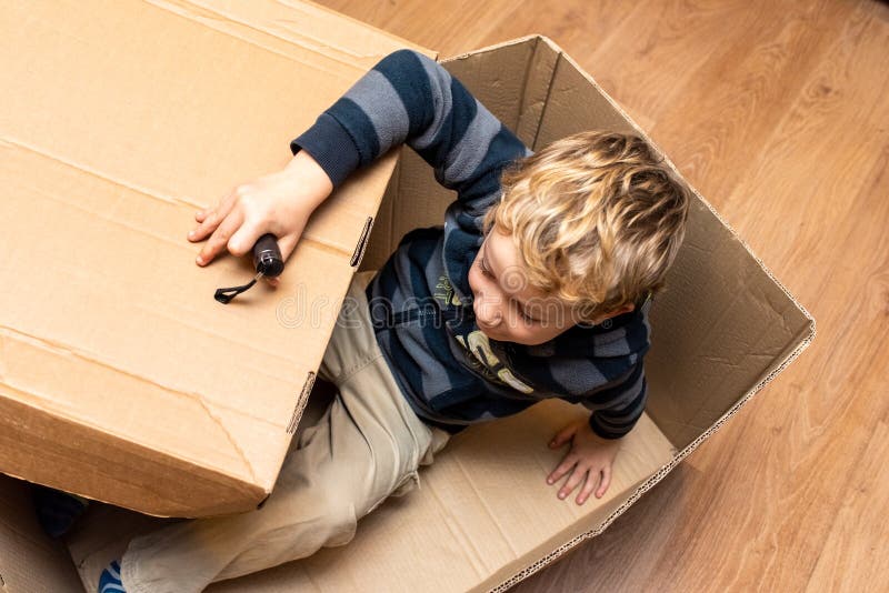 Child Playing Inside a Cardboard Box Stock Image - Image of copy ...