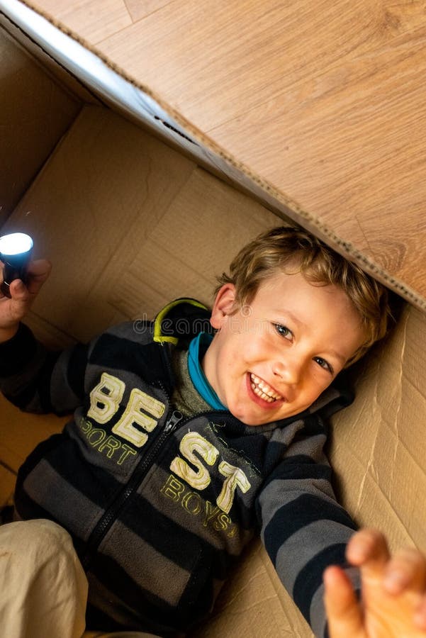 Child Playing Inside a Cardboard Box Stock Photo - Image of childhood ...