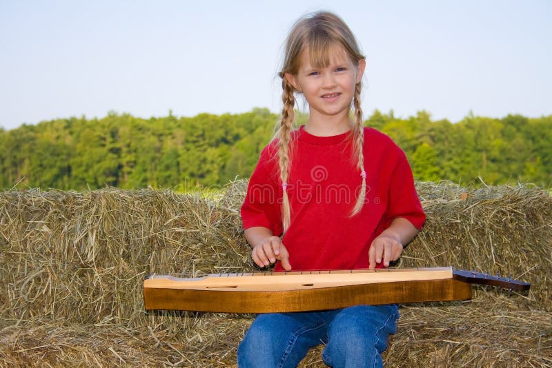 Child playing instrument. stock image. Image of little - 10632889