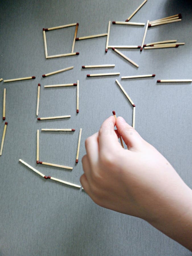 Child playing with matches stock photo. Image of board - 143089030