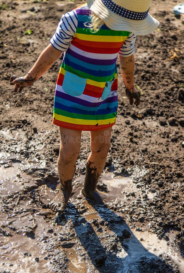 Child Playing in Mud. Selective Focus Stock Photo - Image of mischief ...