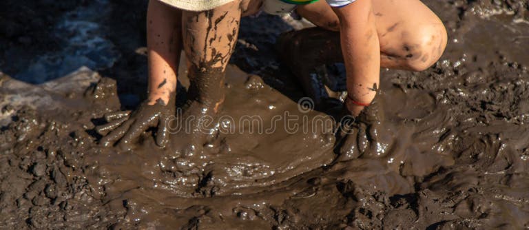 Child Playing in Mud. Selective Focus Stock Image - Image of natural ...