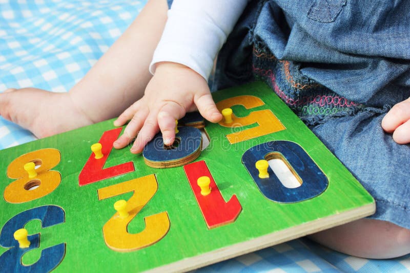 Child Playing with Number Puzzle Stock Image - Image of babies, infant ...