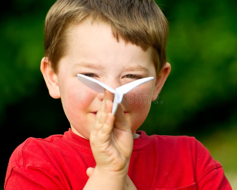Child Playing with Paper Airplane Stock Photo - Image of joyful, person ...