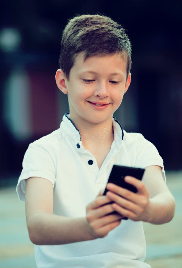 Child playing with phone stock image. Image of lifestyle - 81225595