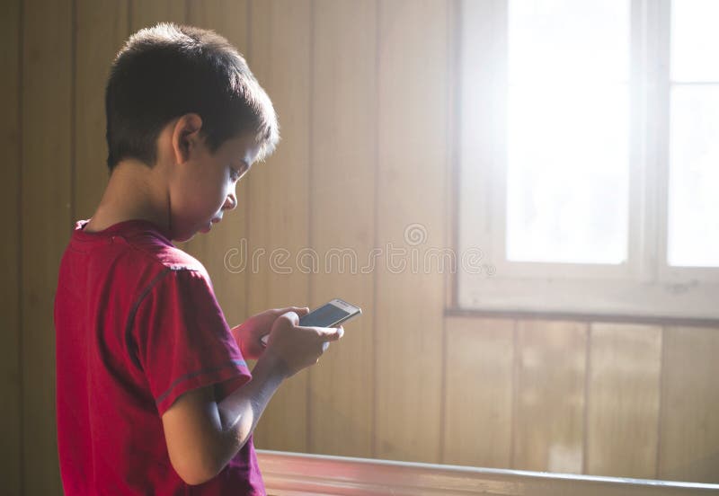 Child with Smartphone Taking a Picture of Baby. Stock Image - Image of ...