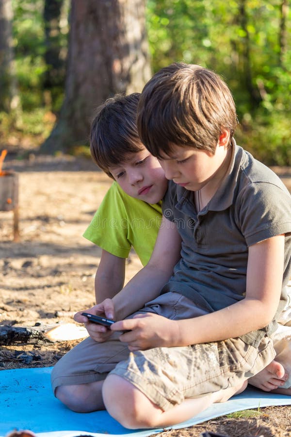 Child Playing Phone Outdoors Stock Image - Image of beautiful, phones ...