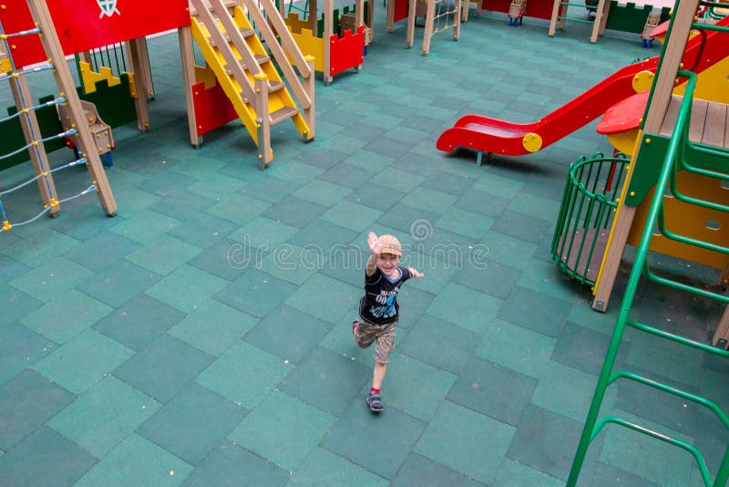 Child Playing on the Playground Stock Image - Image of playful, child ...