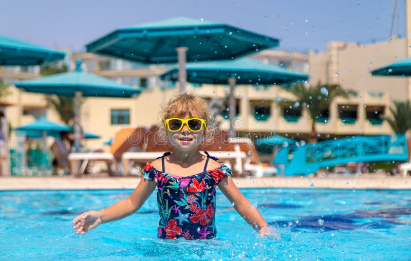 Child Playing in the Pool. Selective Focus Stock Image - Image of ...