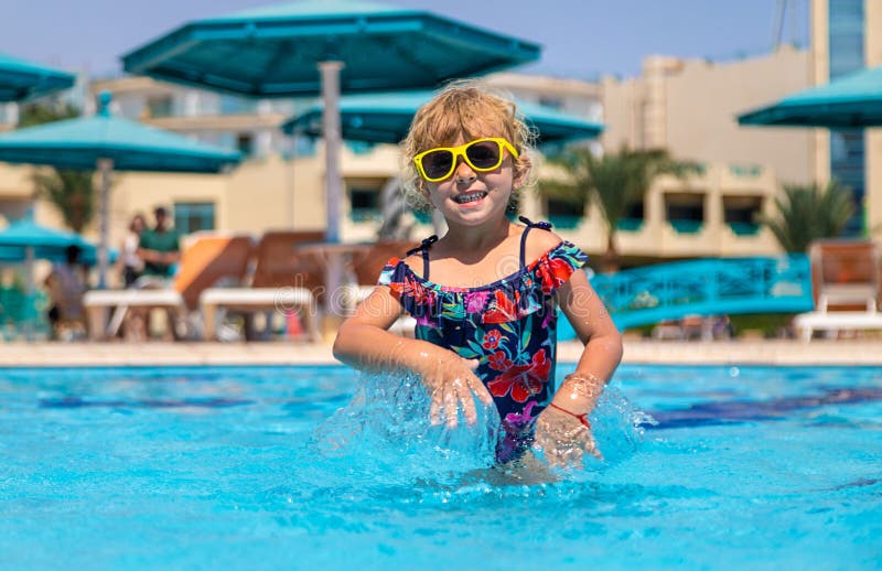 Child Playing in the Pool. Selective Focus Stock Photo - Image of ...