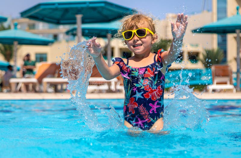 Child Playing in the Pool. Selective Focus Stock Image - Image of ...
