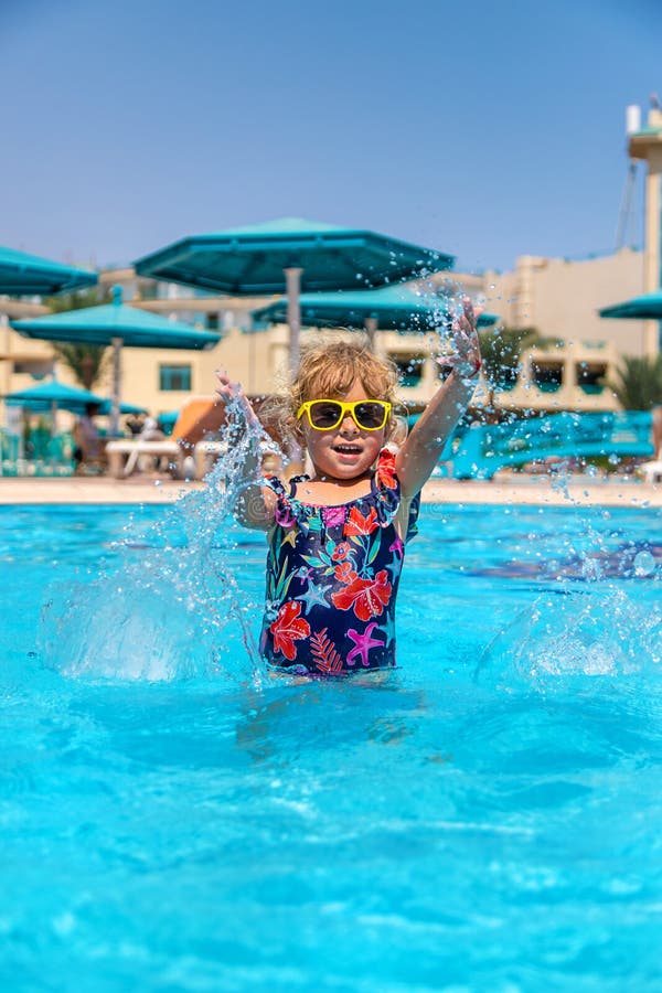 Child Playing in the Pool. Selective Focus Stock Photo - Image of ...