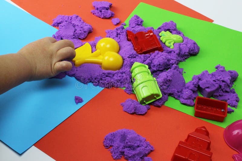 Child Playing with Purple Kinetic Sand Stock Image - Image of hand ...