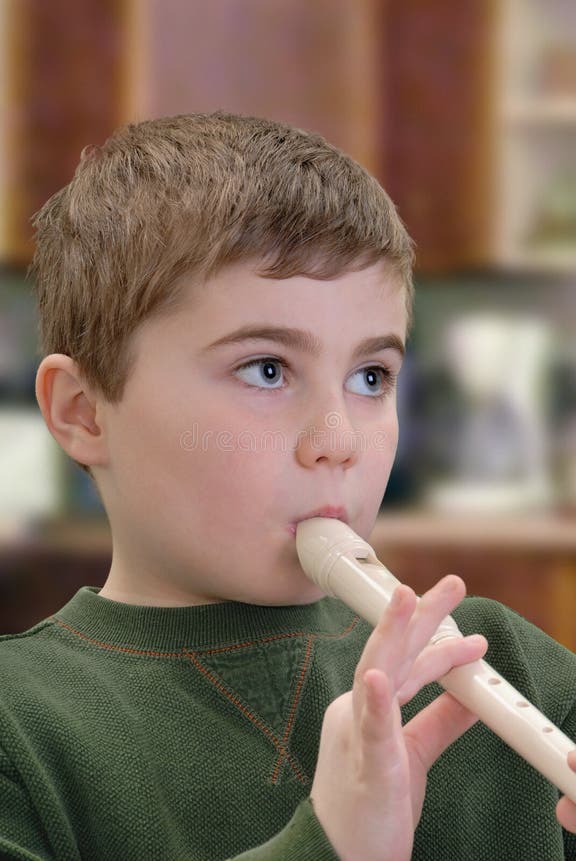 Child Playing Recorder stock image. Image of recorder - 12829217
