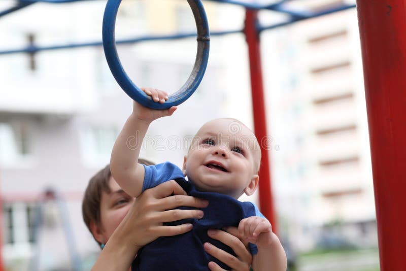 Child playing with rings stock photo. Image of lifestyles - 25878830