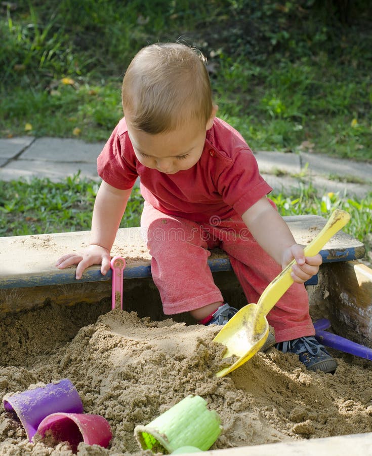 Child Playing In Sandbox Picture. Image: 27249505