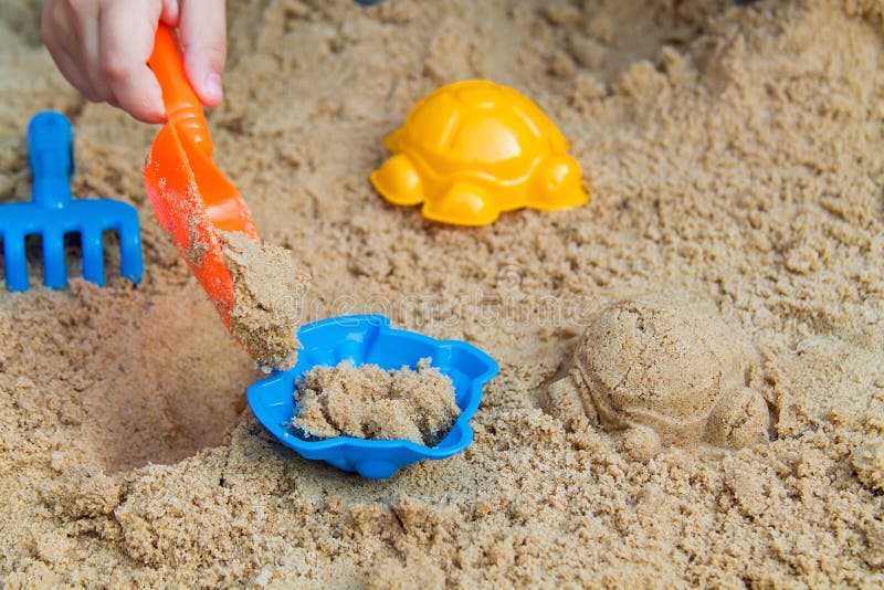 Child Playing in the Sandbox Stock Image - Image of overlay, pink ...