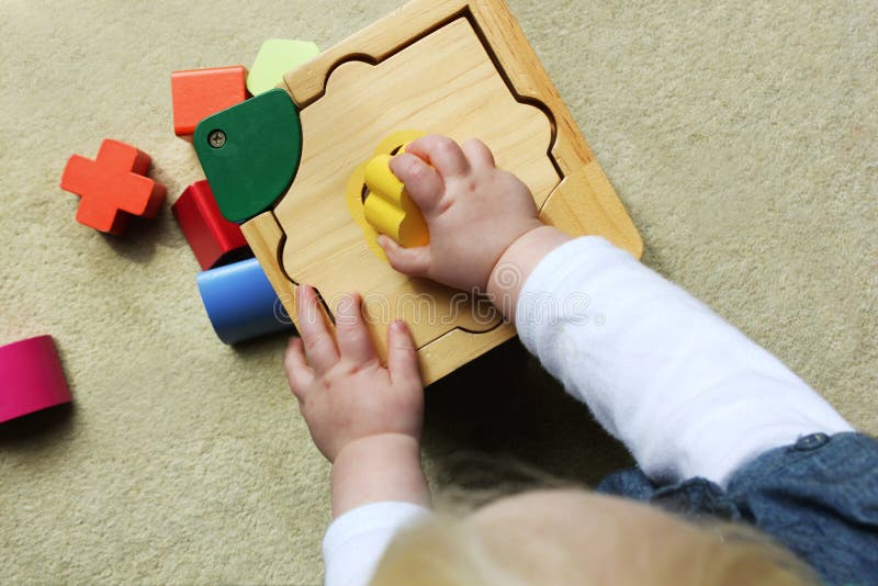 Child Playing with Shape Sorter Stock Image - Image of communication ...