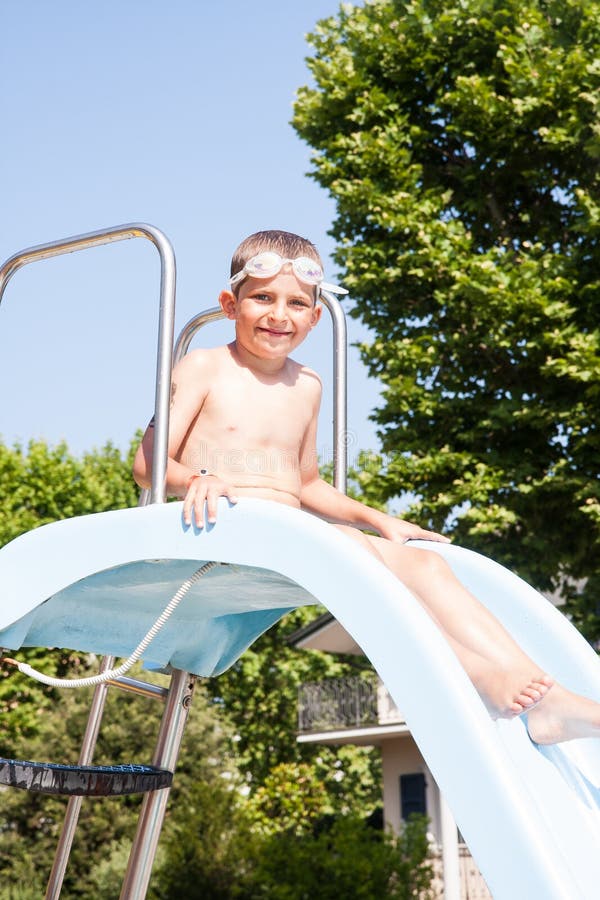 Child Playing with the Slide in the Pool Stock Photo - Image of slide ... Child Playing with the Slide in the Pool Stock Photo - Image of slide ...