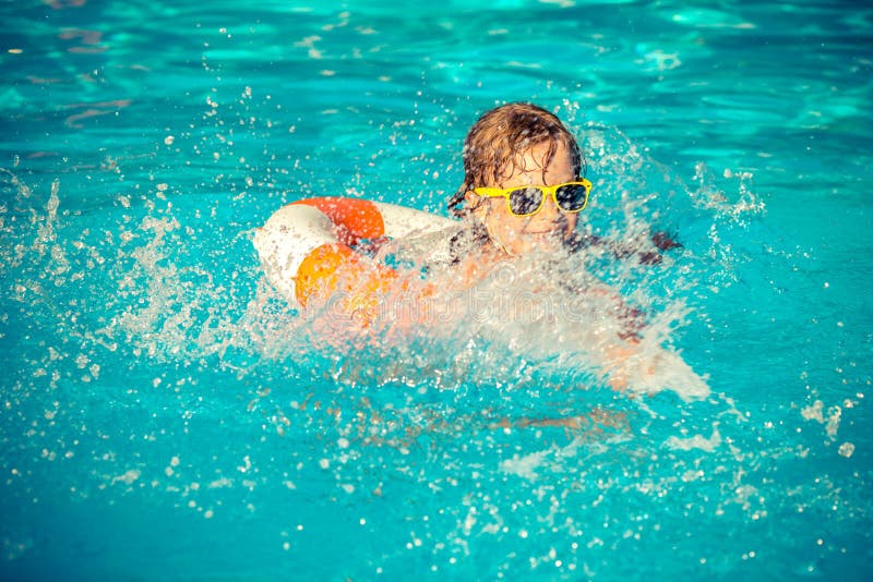 Child Playing in Swimming Pool Stock Photo - Image of leisure, baby ...