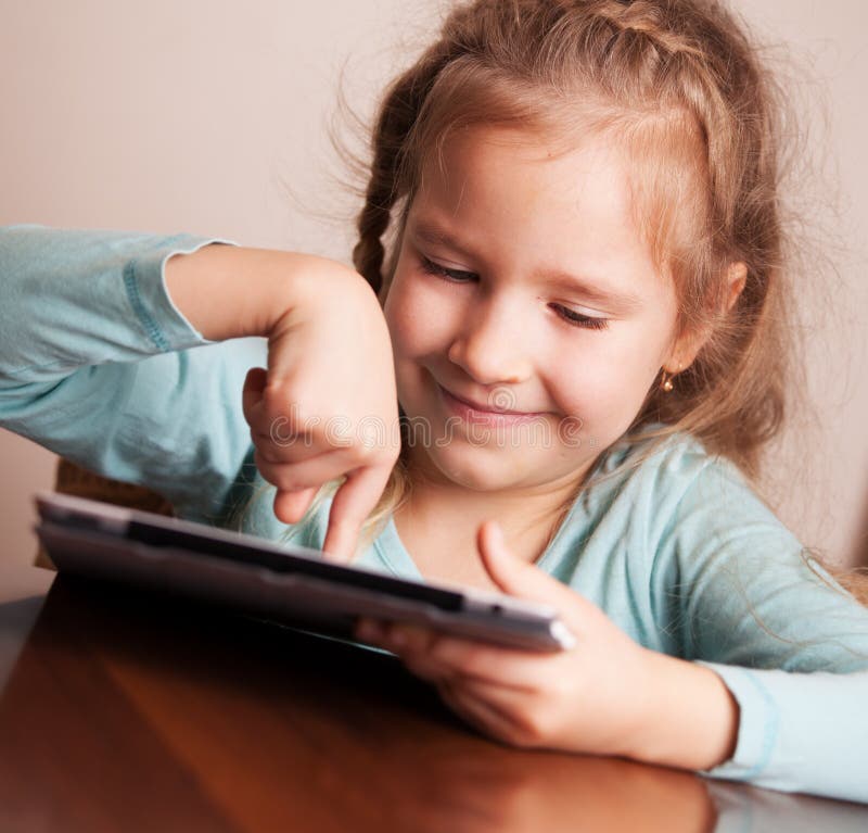 Child playing on tablet stock photo. Image of caucasian - 29219248