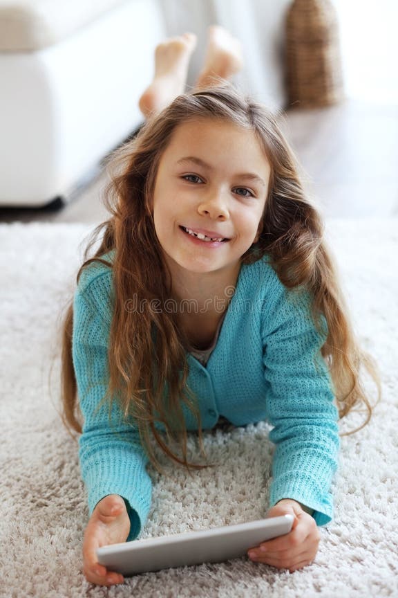 Child playing on tablet pc stock photo. Image of happy - 37393516