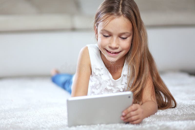Child playing on tablet pc stock image. Image of person - 35331651