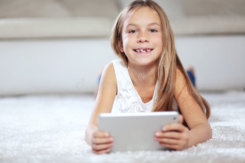 Child playing on tablet pc stock image. Image of notebook - 35331771