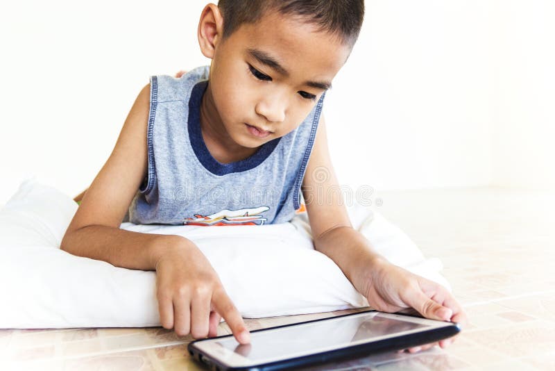 Boy with iPad stock image. Image of games, human, game - 29343253