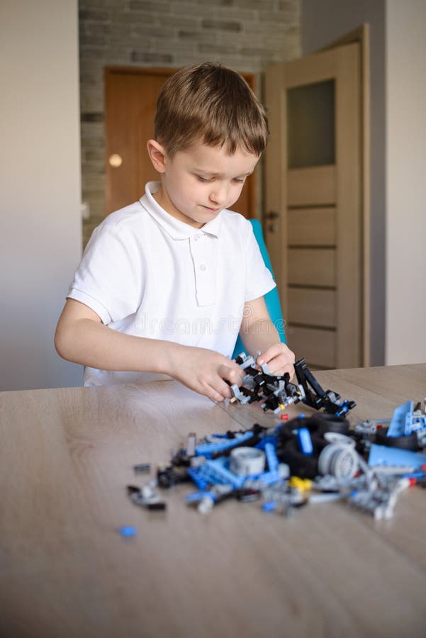 Child Playing Technic Plastic Blocks Indoor Stock Photos - Free ...