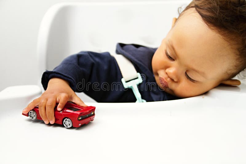 Child playing with toy car stock image. Image of child - 97886951