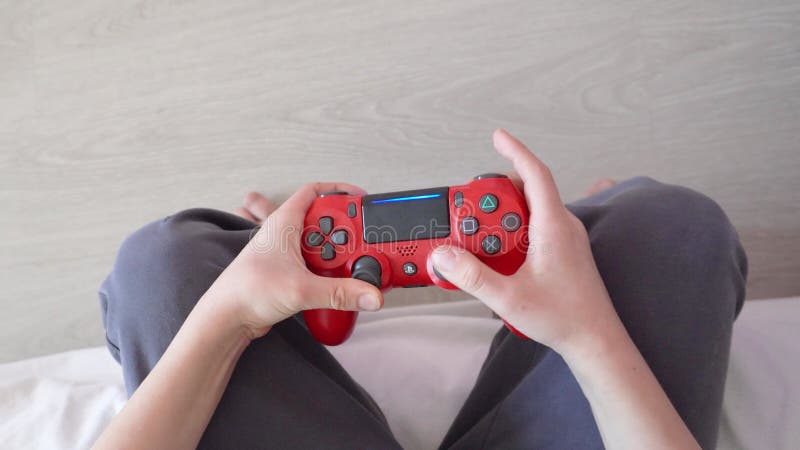 Gameplay with a Red PlayStation Gamepad, Top View Stock Video - Video ...