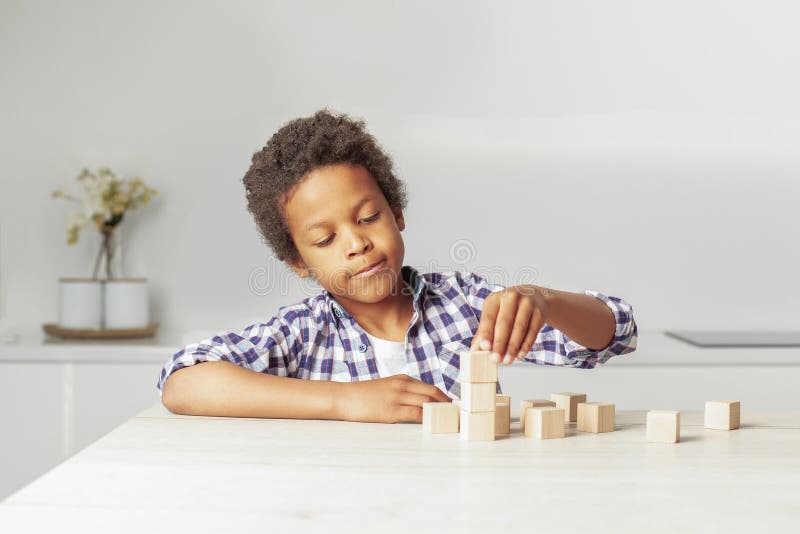 Child Playing with Wooden Blocks. Kindergarten Educational Games Stock ...