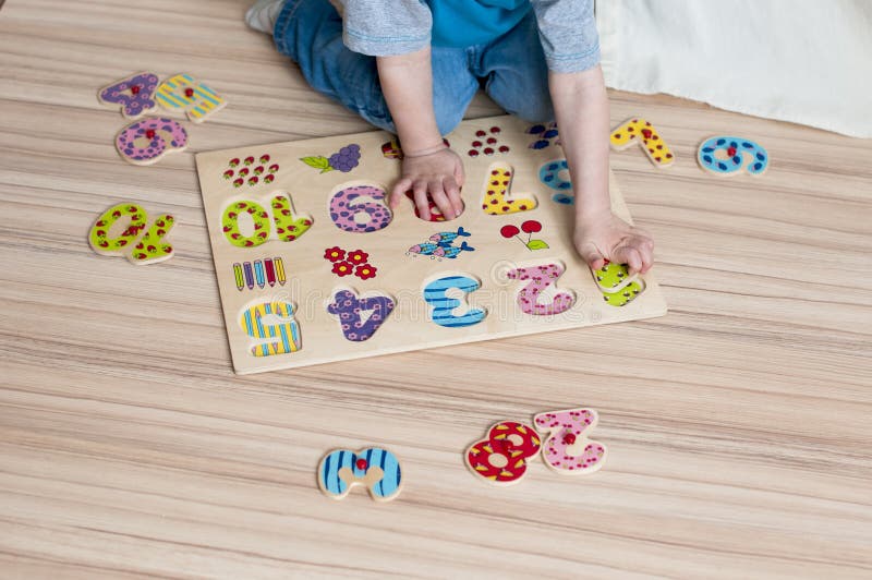 Child Playing with Wooden Numbers Stock Image - Image of recess ...