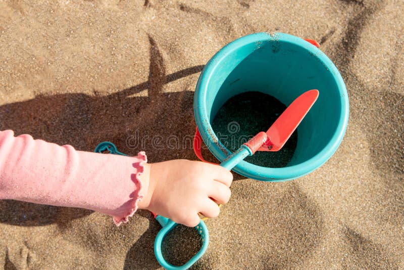 Child Playing Yellow Sand on Beach, Kid in Sandbox, Close Up Hand Stock ...
