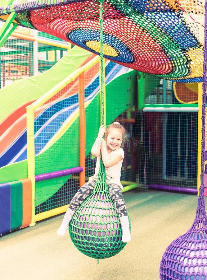 Child Plays Fun in the Entertainment Center. Game Center Stock Image ...