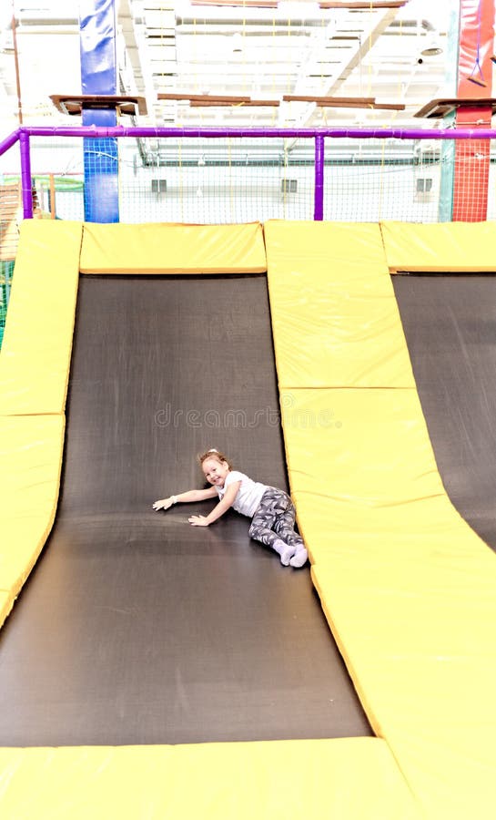 Child Plays Fun in the Entertainment Center. Game Center Stock Image ...