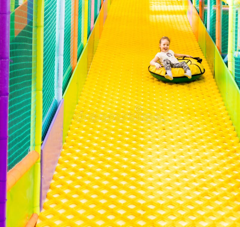 Child Plays Fun in the Entertainment Center. Game Center Stock Photo ...