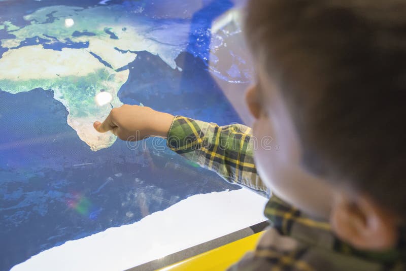 Child Pointing Africa on a Map Stock Image - Image of background ...