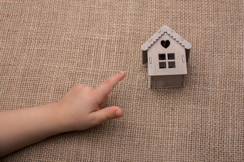 Child Pointing at a Model House Stock Image - Image of housing ...