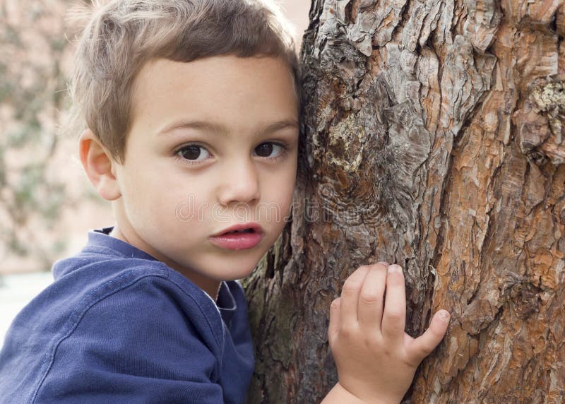 Child portrait by tree stock photo. Image of leisure - 54977756