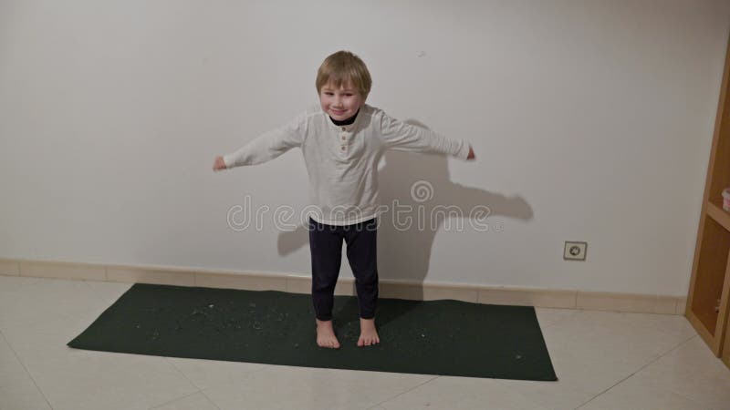 Young Boy Performing Dance Steps on Yoga Mat Stock Video - Video of ...