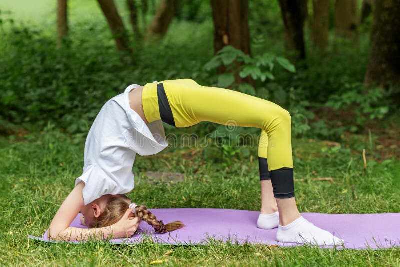 Child Practicing Forearm Backbend Yoga Pose Stock Photo - Image of 1011 ...