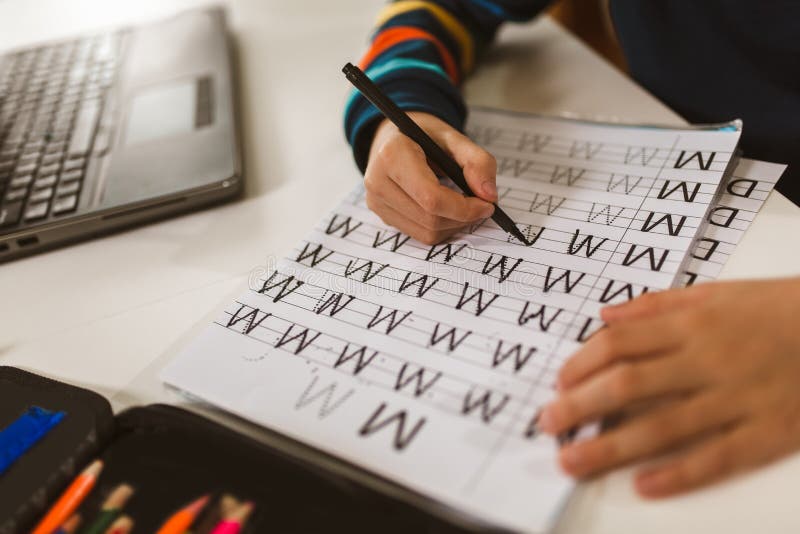 Child Practicing Writing at Home Stock Photo - Image of class, concept ...